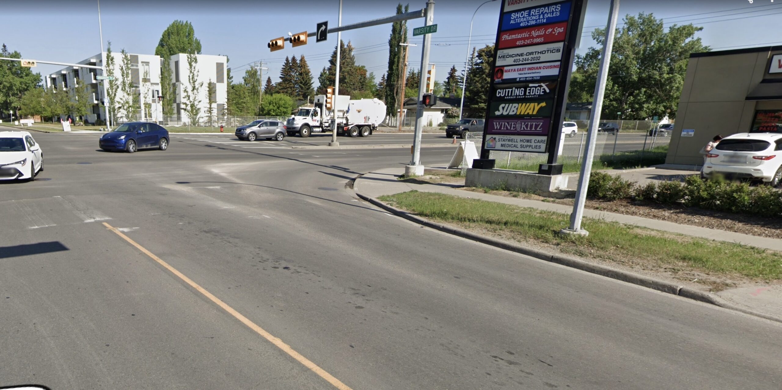 Roadway in Calgary, AB with faded crosswalk and no lane separation ...